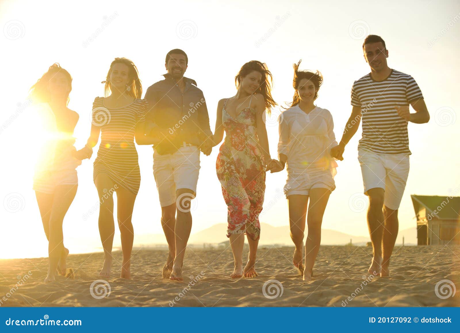 Happy People Group Have Fun and Running on Beach Stock Photo - Image of ...