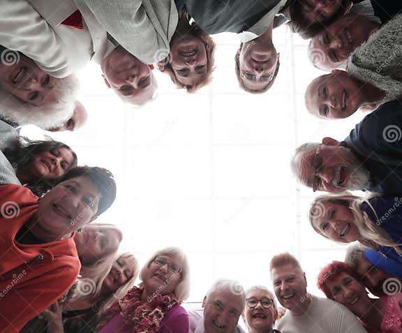 Happy People Looking Down at Camera Stock Photo - Image of friendship ...