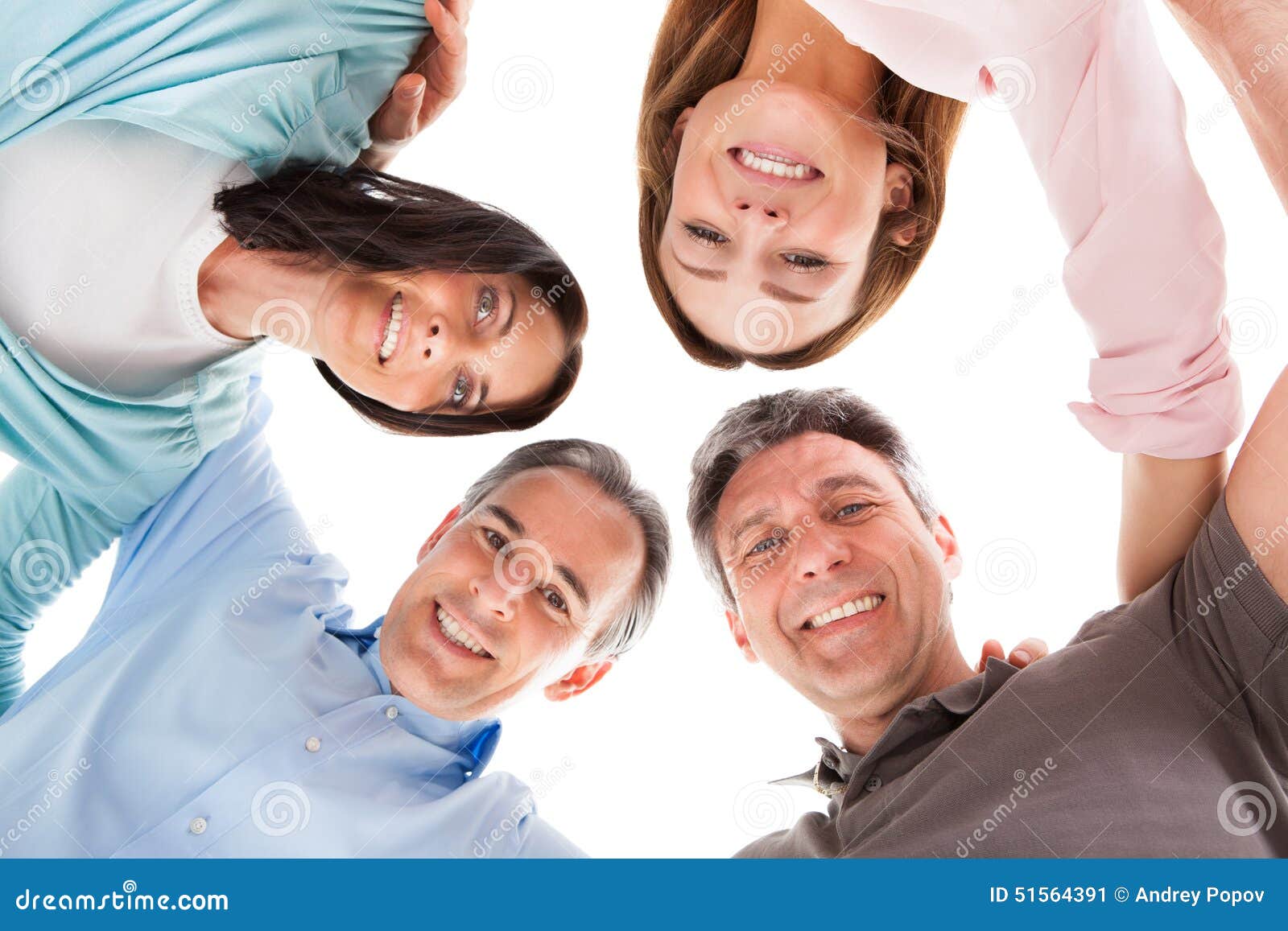 Happy people making huddle stock image. Image of hand - 51564391