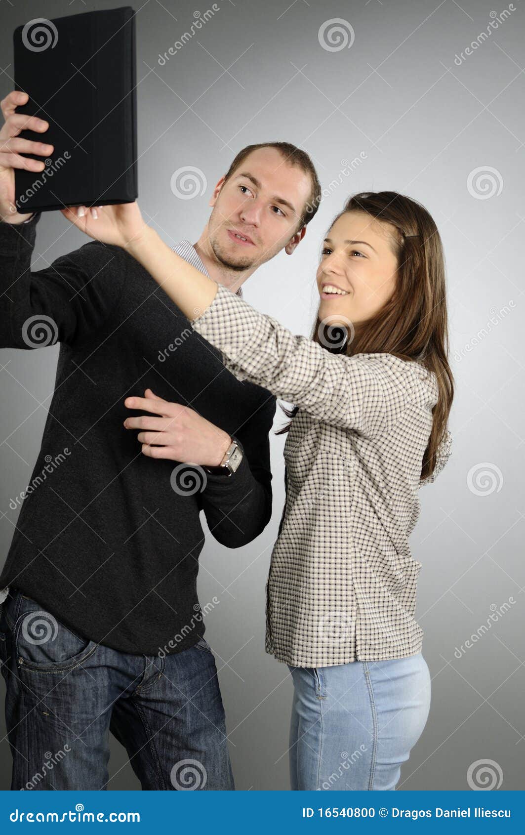 Happy People Showing on Computer Stock Photo - Image of team, jeans ...