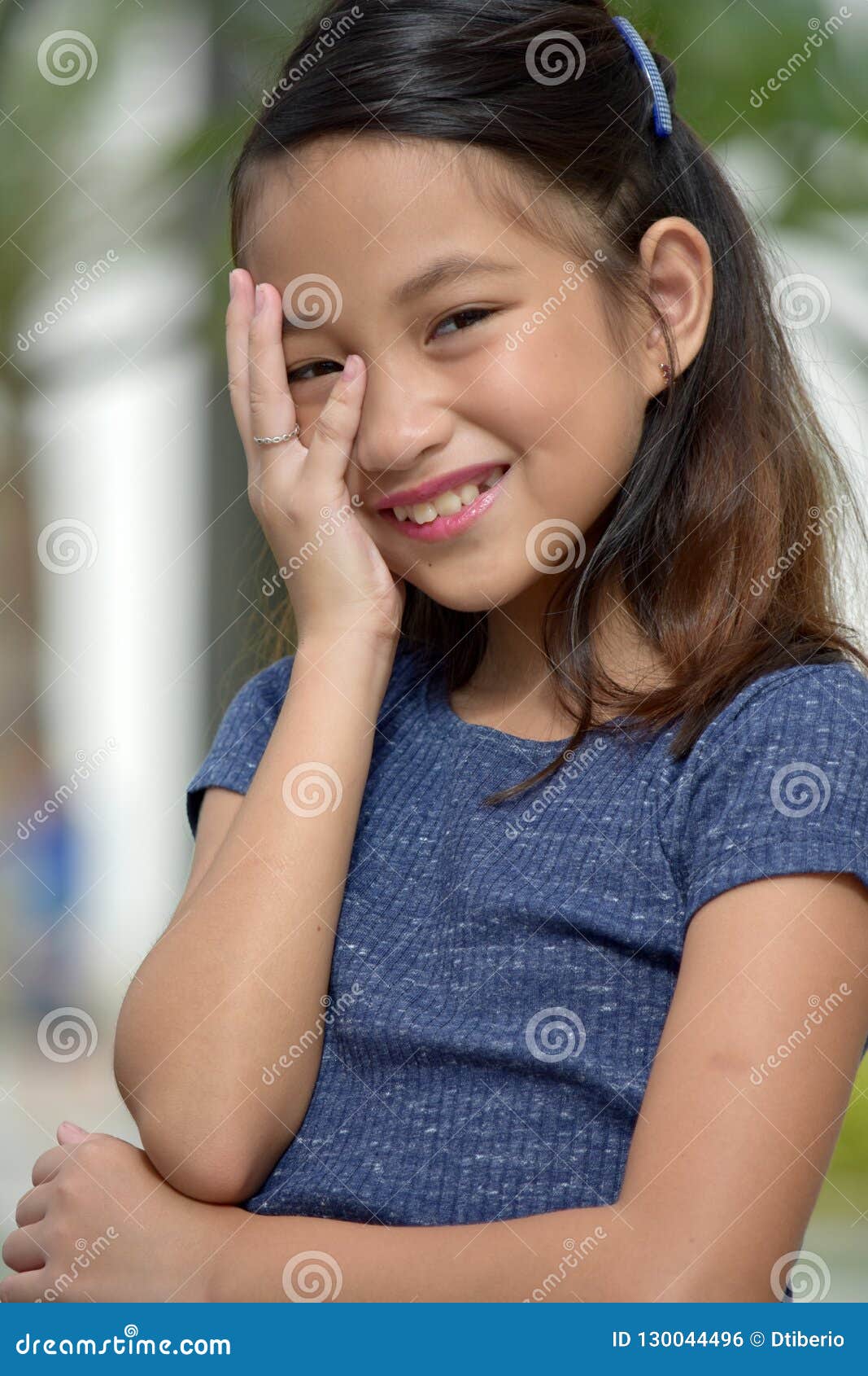 Happy Petite Asian Person stock photo. Image of asian - 130044496