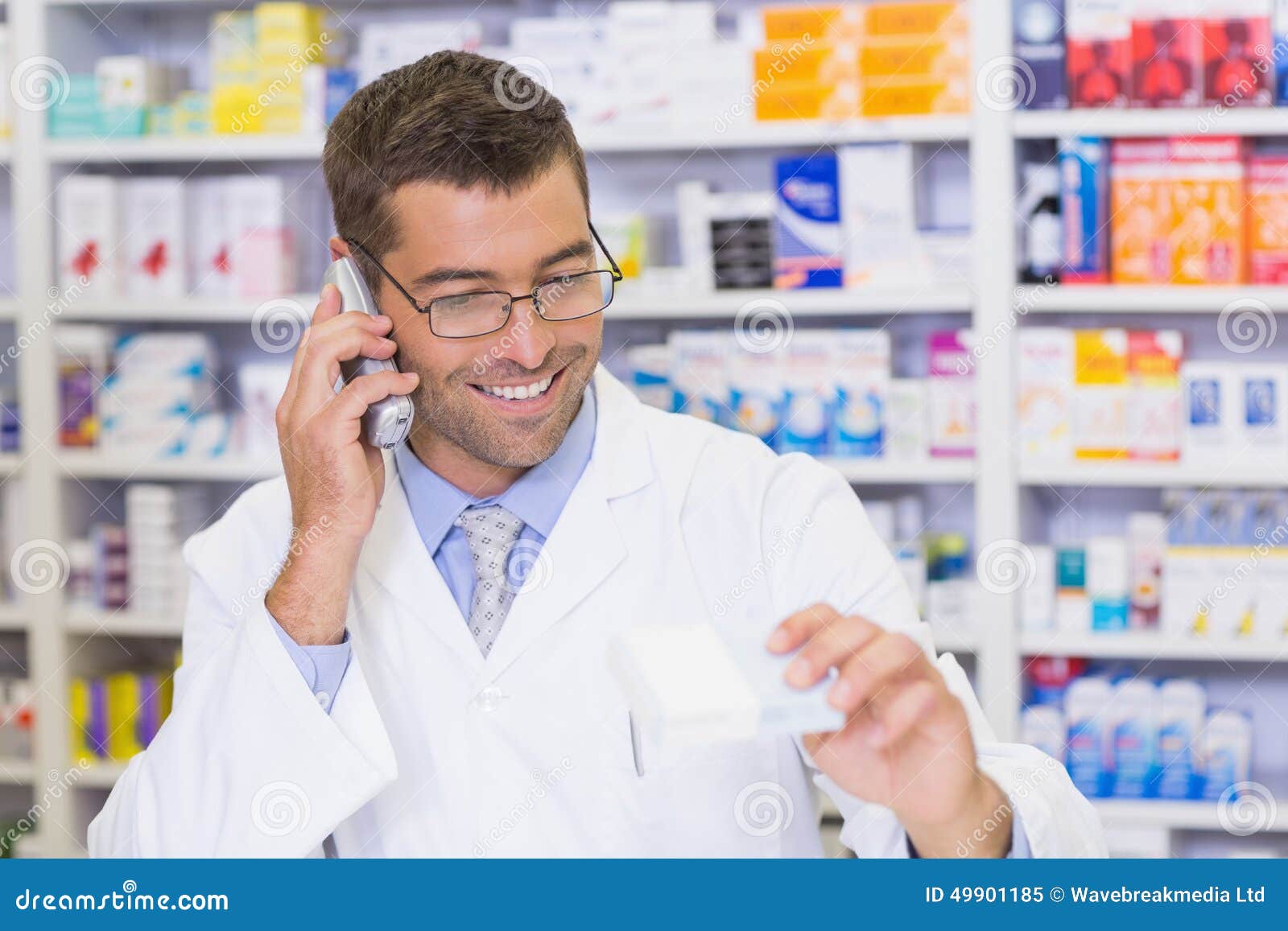 Happy Pharmacist on the Phone Stock Image - Image of drugstore ...