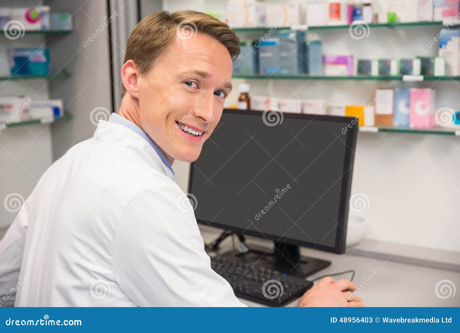 Happy Pharmacist Using the Computer Stock Image - Image of person, drug ...