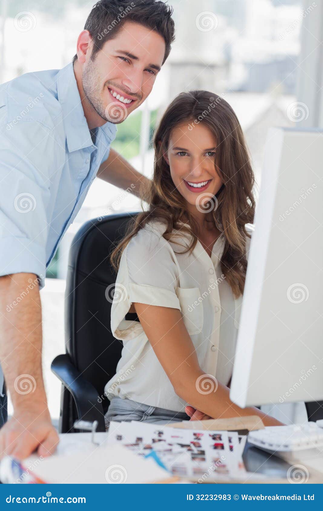 Happy Photo Editors Working Together on a Computer Stock Image - Image ...