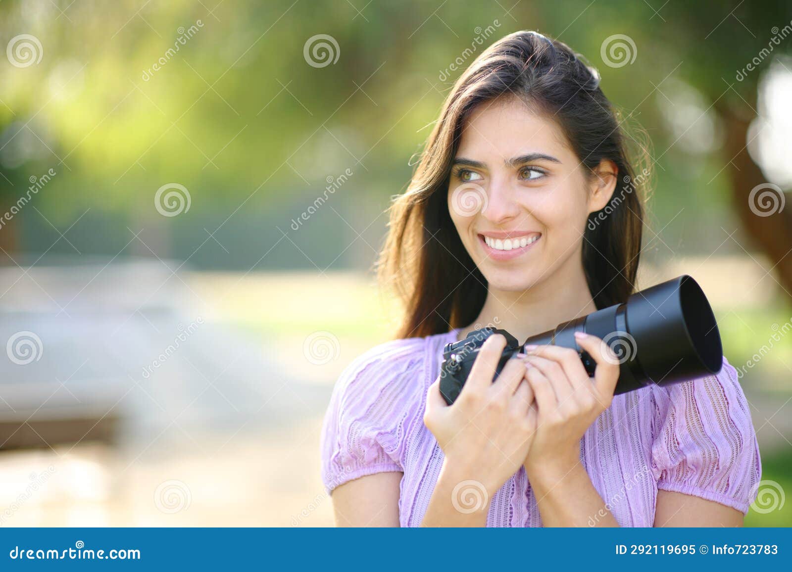 Happy Photographer Looking at Side in a Park Stock Image - Image of ...