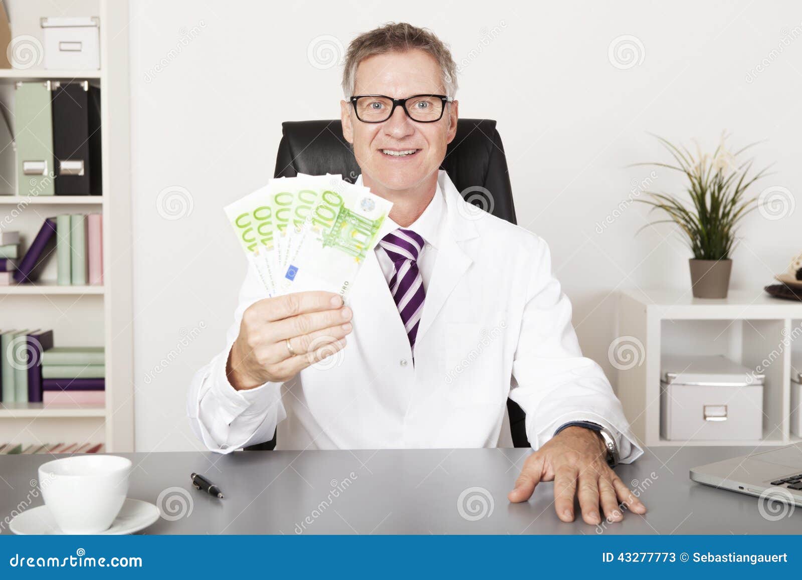Happy Physician Holding Cash Stock Image - Image of doctor, euro: 43277773