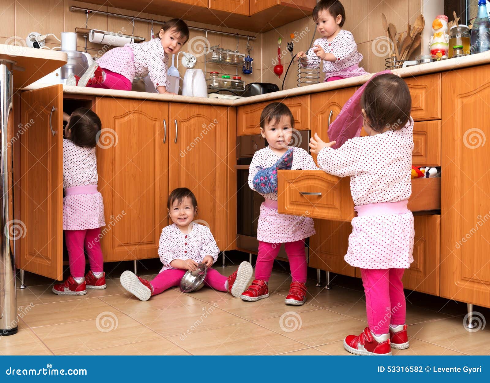 Happy Playful Girl Playing in the Kitchen Stock Photo - Image of ...