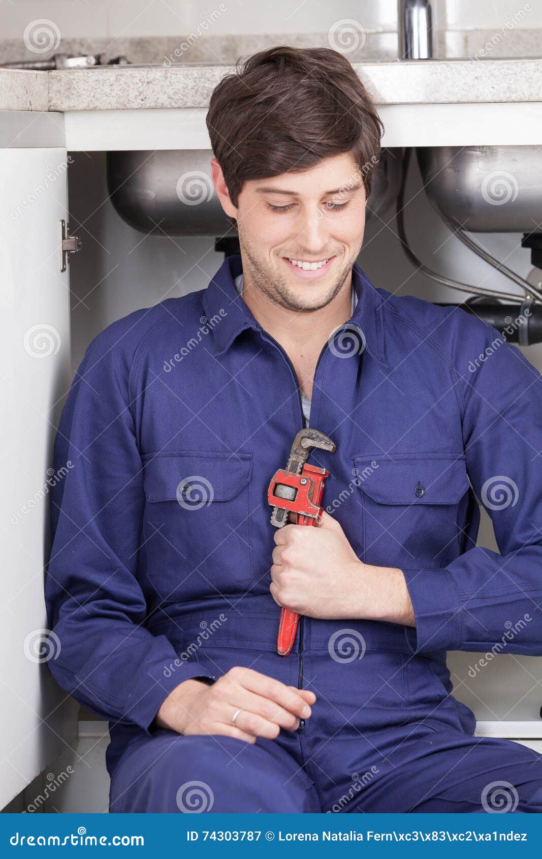 Happy Plumber Holding His Wrench Stock Image - Image of plumbing ...