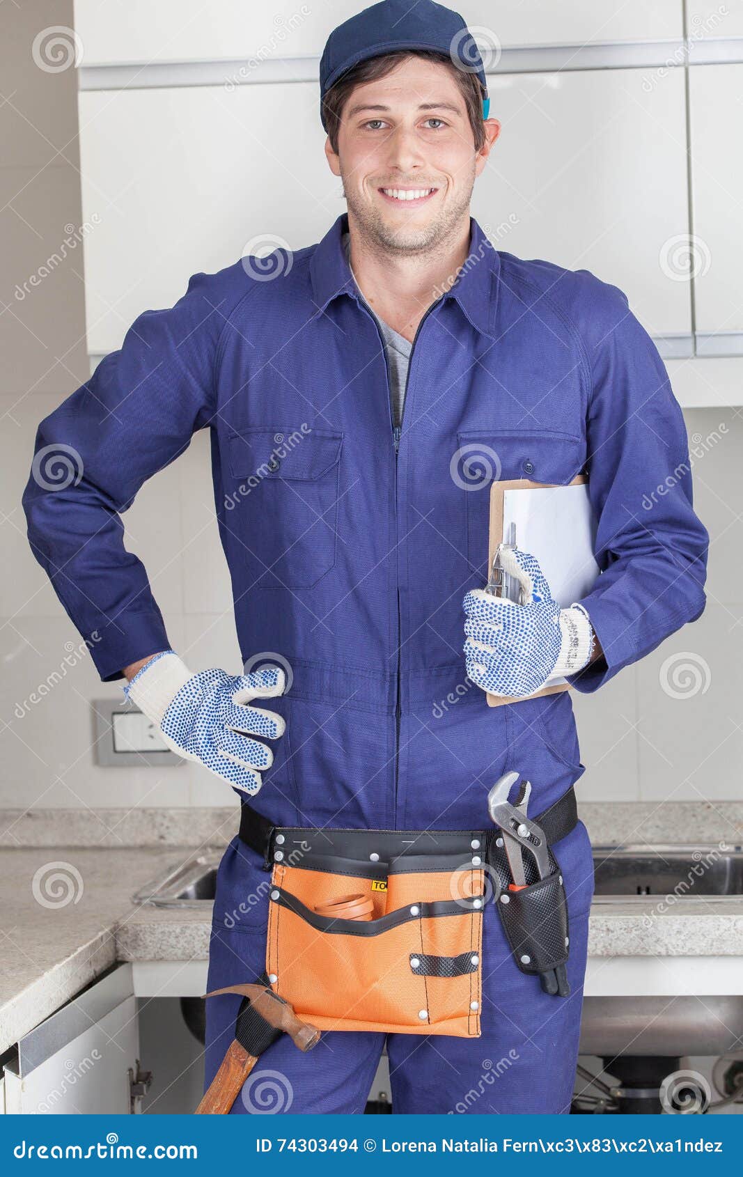 Happy plumber stock photo. Image of model, construction - 74303494