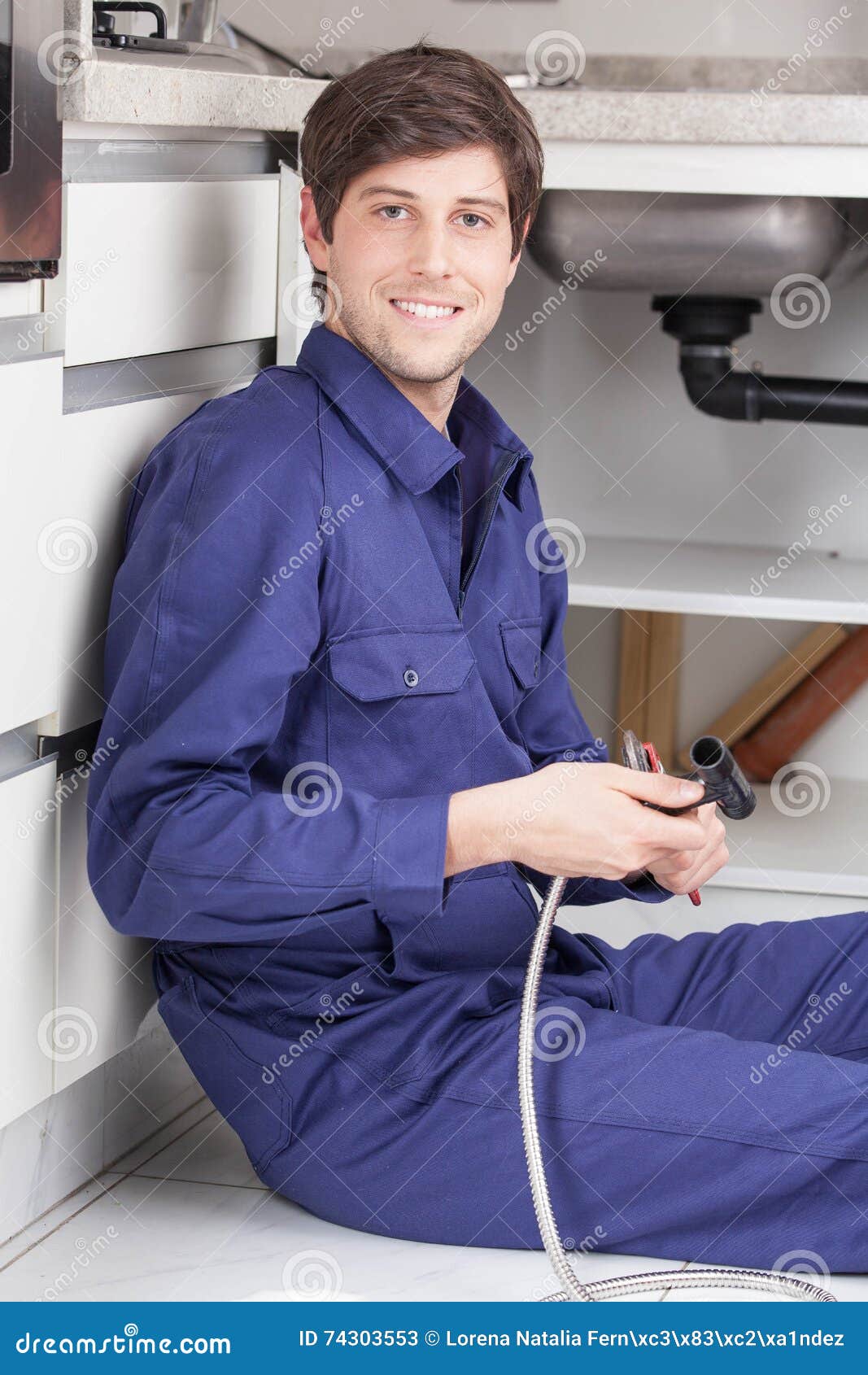Happy Plumber Sitting on the Floor Stock Image - Image of manual ...