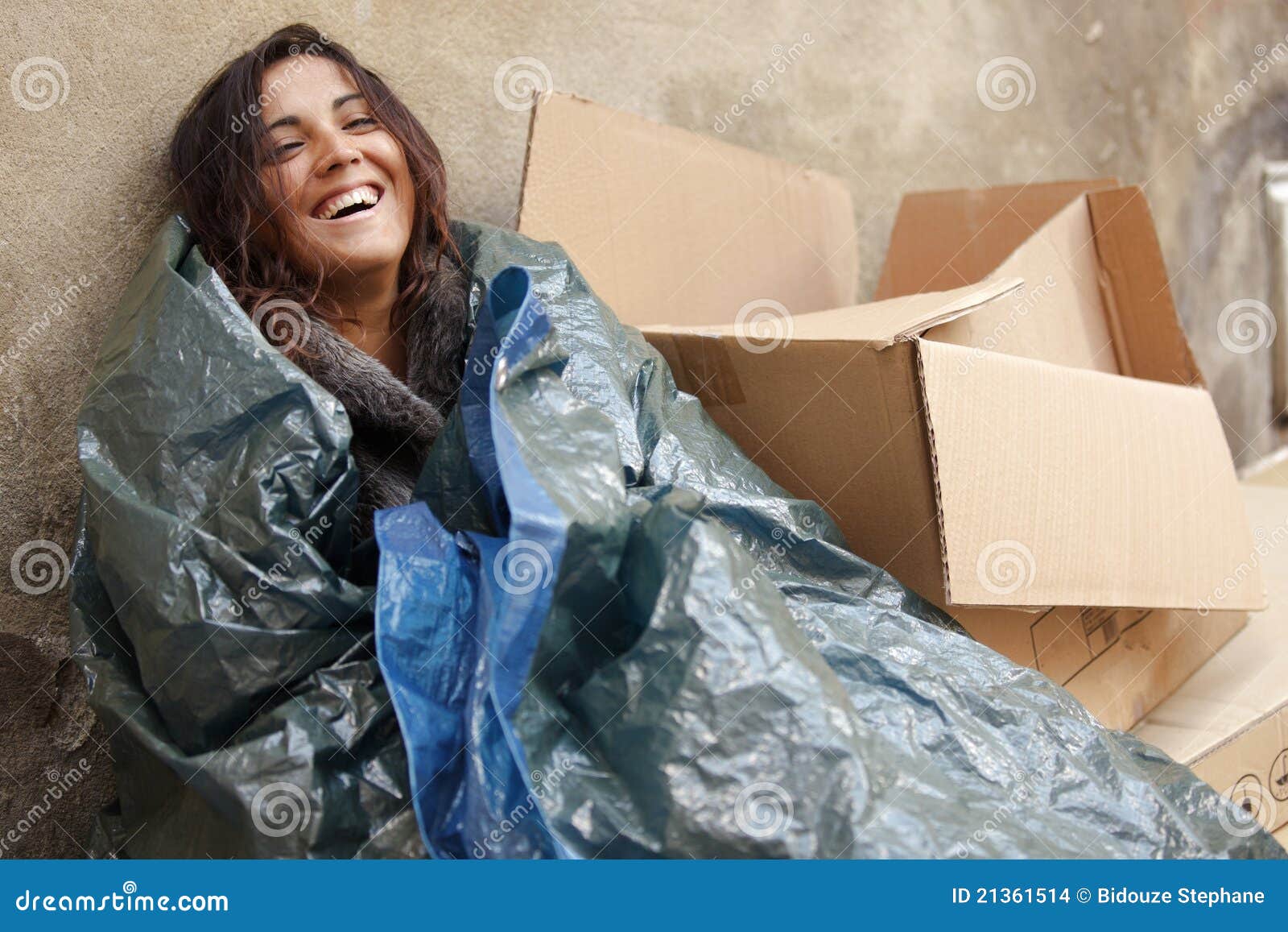 Happy poor woman stock photo. Image of covered, city - 21361514