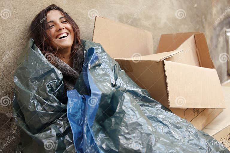 Happy poor woman stock photo. Image of covered, city - 21361514