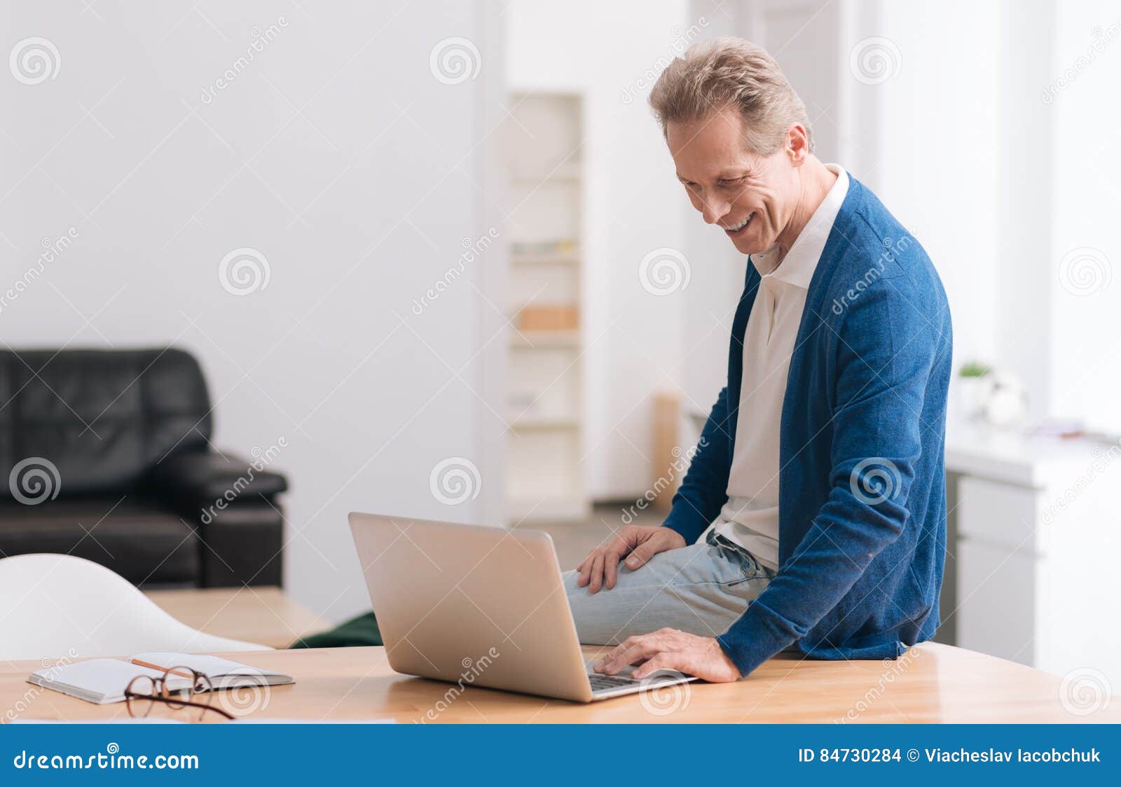 Happy Positive Man Sitting on the Table Stock Photo - Image of male ...