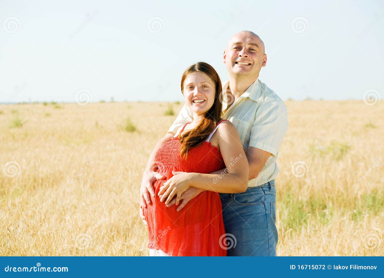 Happy pregnant couple stock photo. Image of outdoors - 16715072