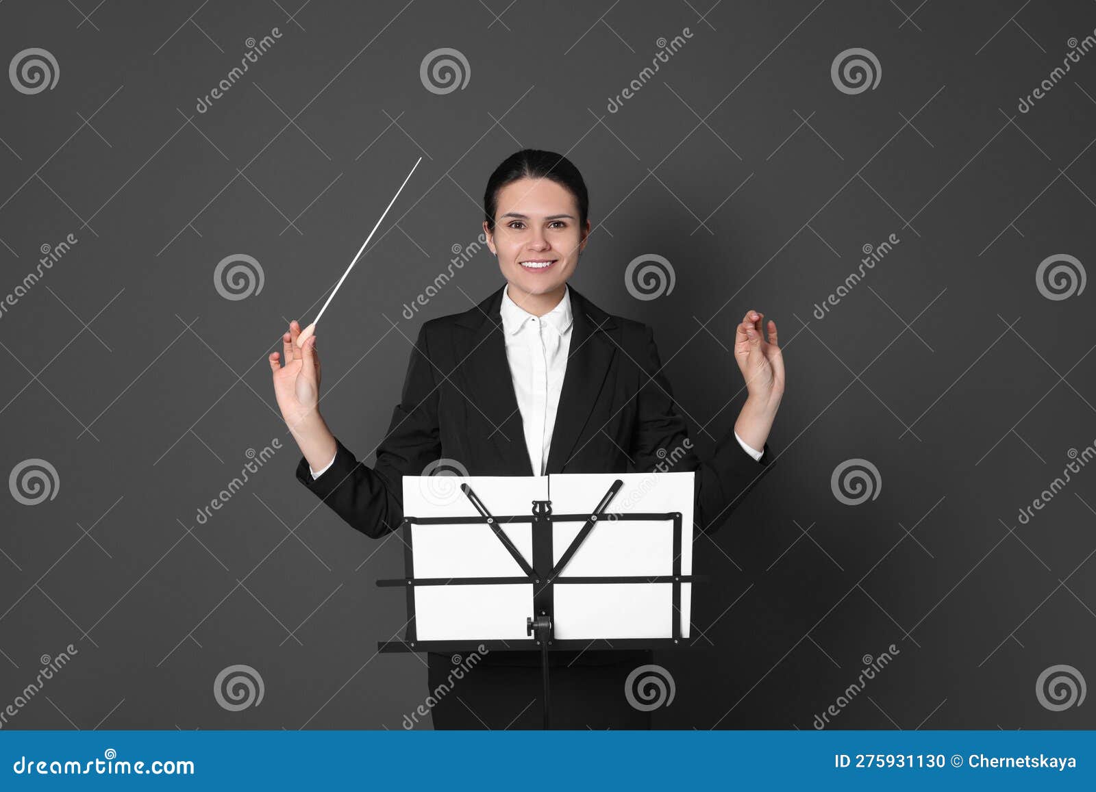 Happy Professional Conductor with Baton and Note Stand on Grey ...