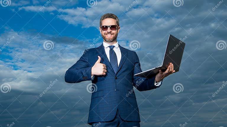 Happy Programmer Holding Laptop. Computer Programmer Showing Thumb ...