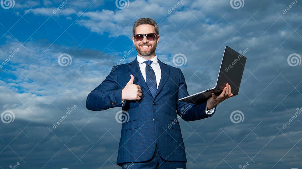 Happy Programmer Holding Laptop. Computer Programmer Showing Thumb ...
