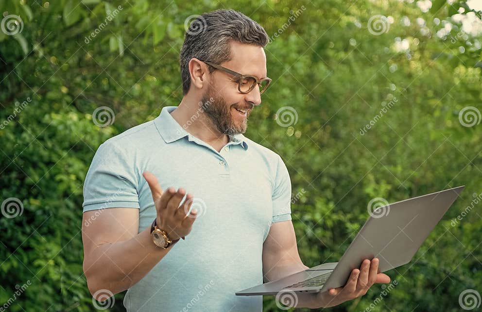 Happy Programmer Man Working Online on Laptop. Photo of Programmer Man Online on Computer Stock ...