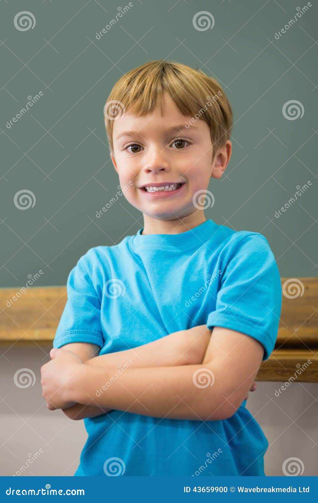 Happy Pupil Smiling at Camera in Classroom Stock Photo - Image of cute ...