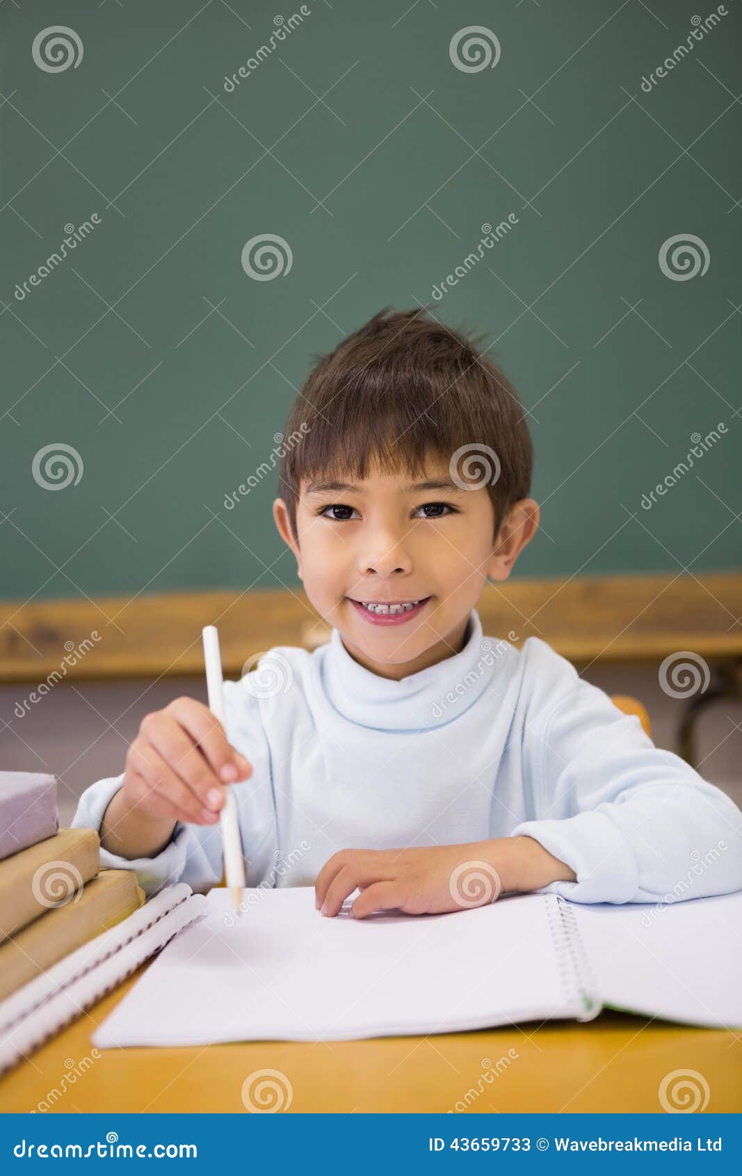 Happy Pupil Smiling at Camera at Desk Stock Image - Image of early ...