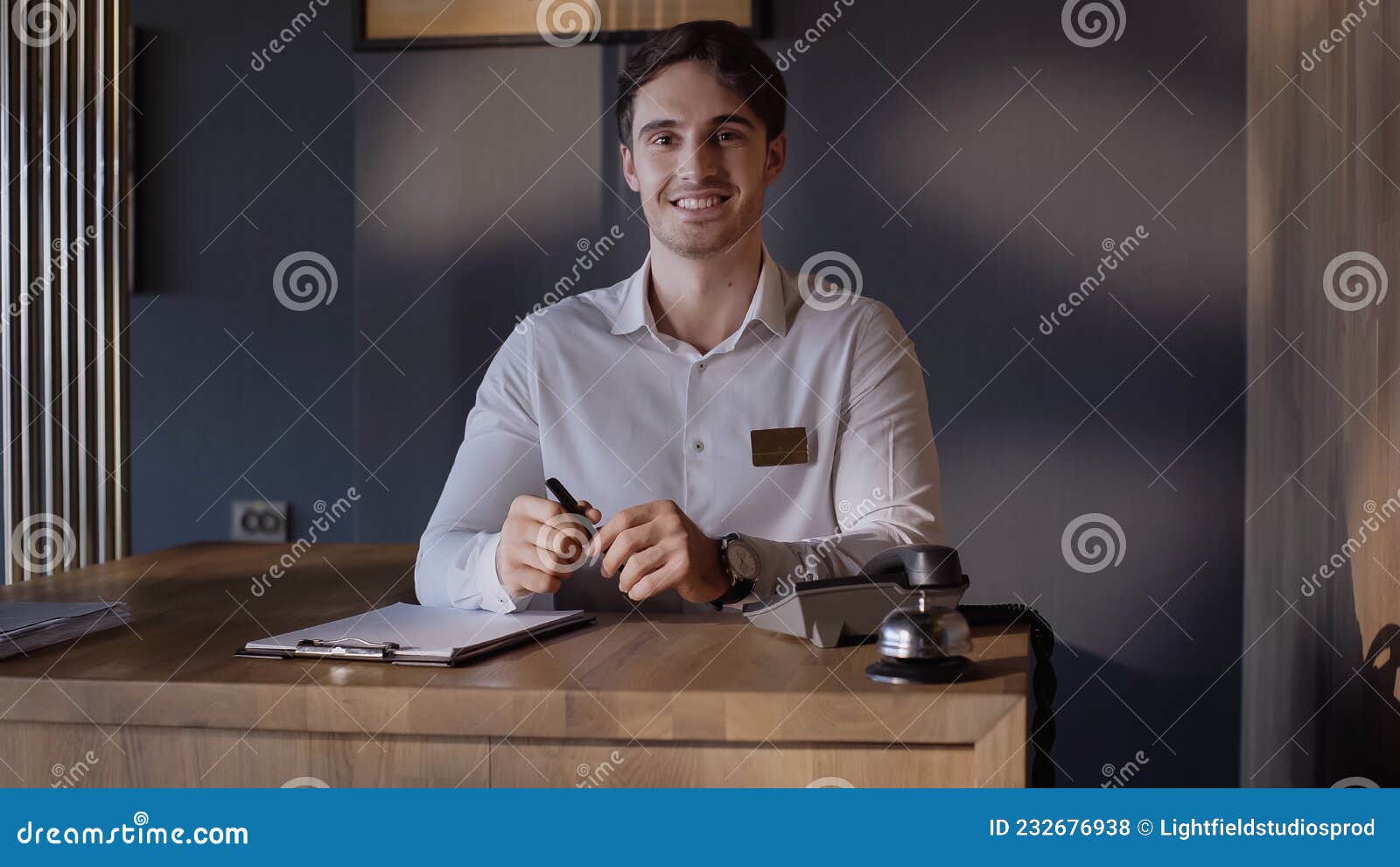 Happy Receptionist Smiling And Talking On Royalty-Free Stock ...