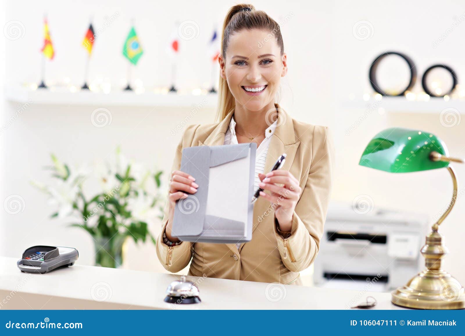 Happy Receptionist Working in Hotel Stock Image - Image of reception ...