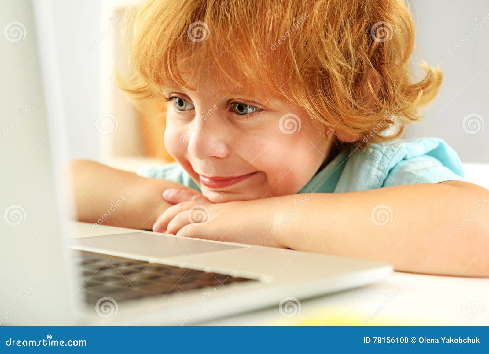 Happy Redhead Boy Playing on Laptop Stock Photo - Image of emotional ...