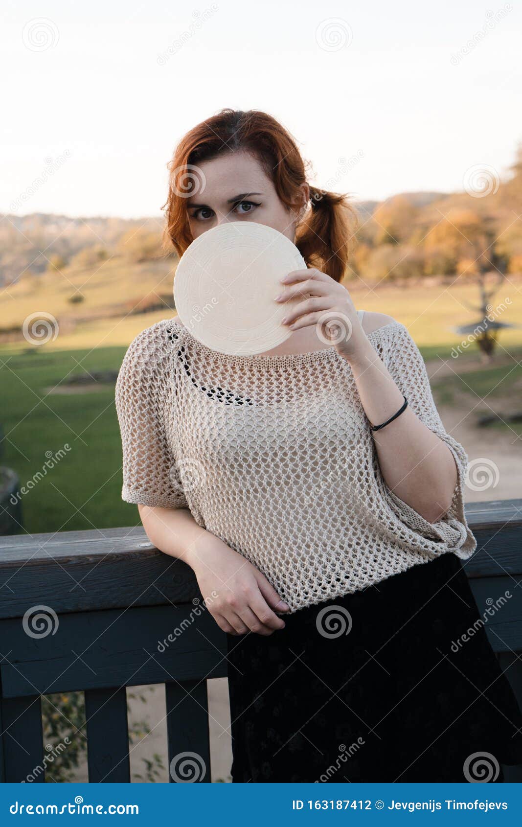 Happy Redhead Woman Enjoys Tradicional Czech Sweet Waffer Food Oplatky