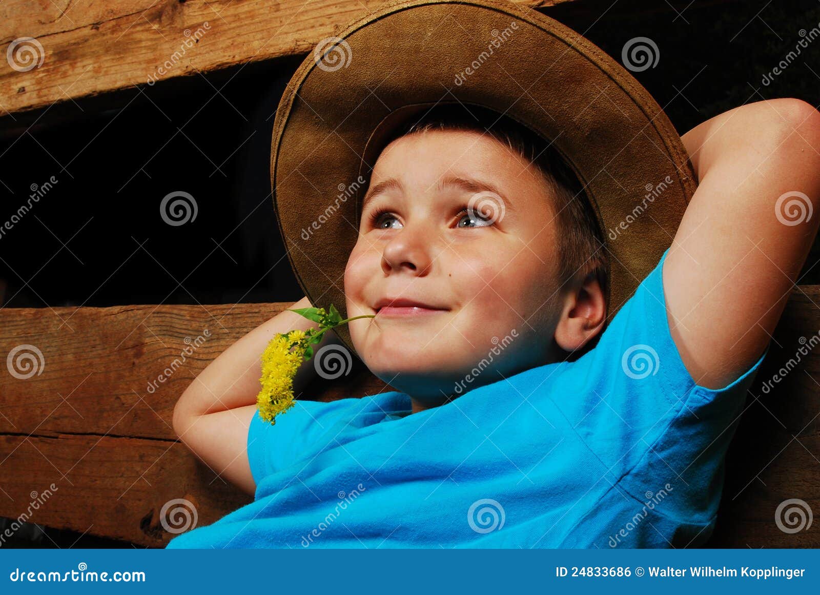 Happy relaxing little boy stock photo. Image of people - 24833686