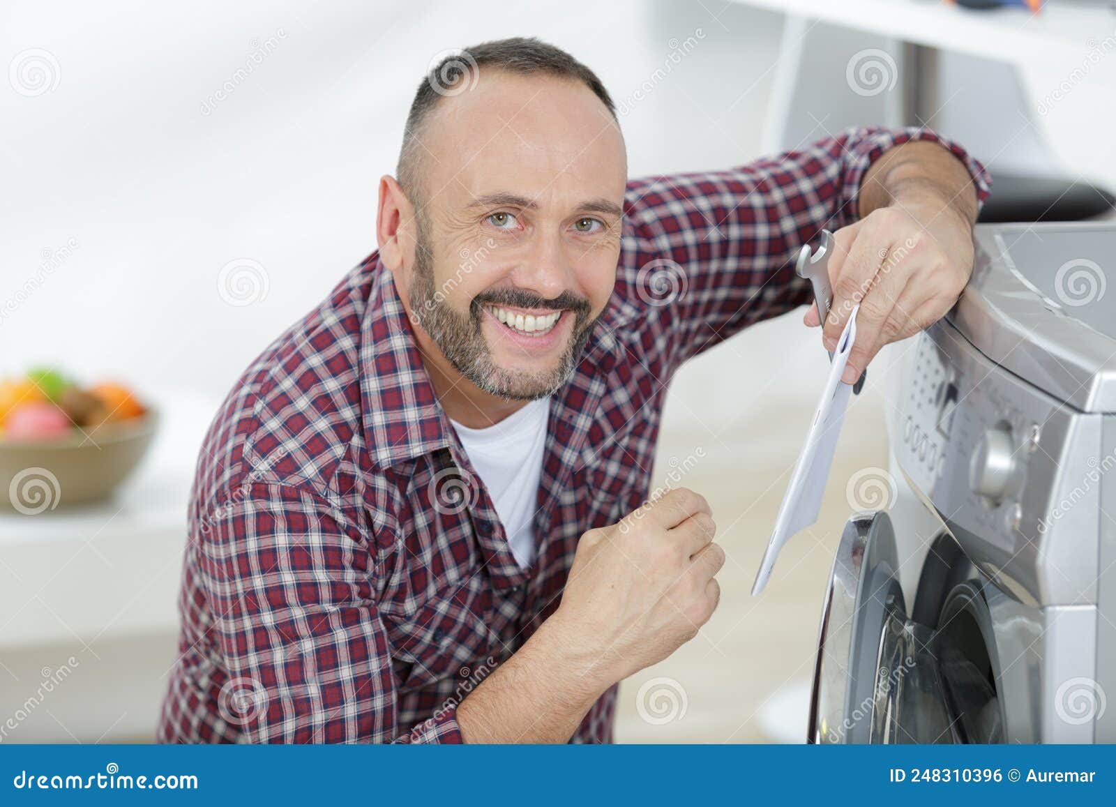 Happy Repairman Looking at Camera Stock Photo - Image of maintenance ...