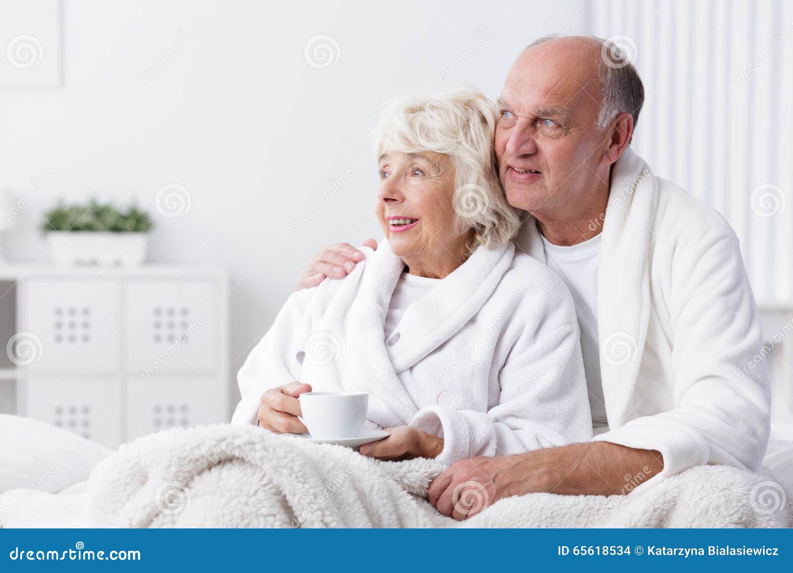 Happy Retired Couple in Bed Stock Photo - Image of retirement, couple ...
