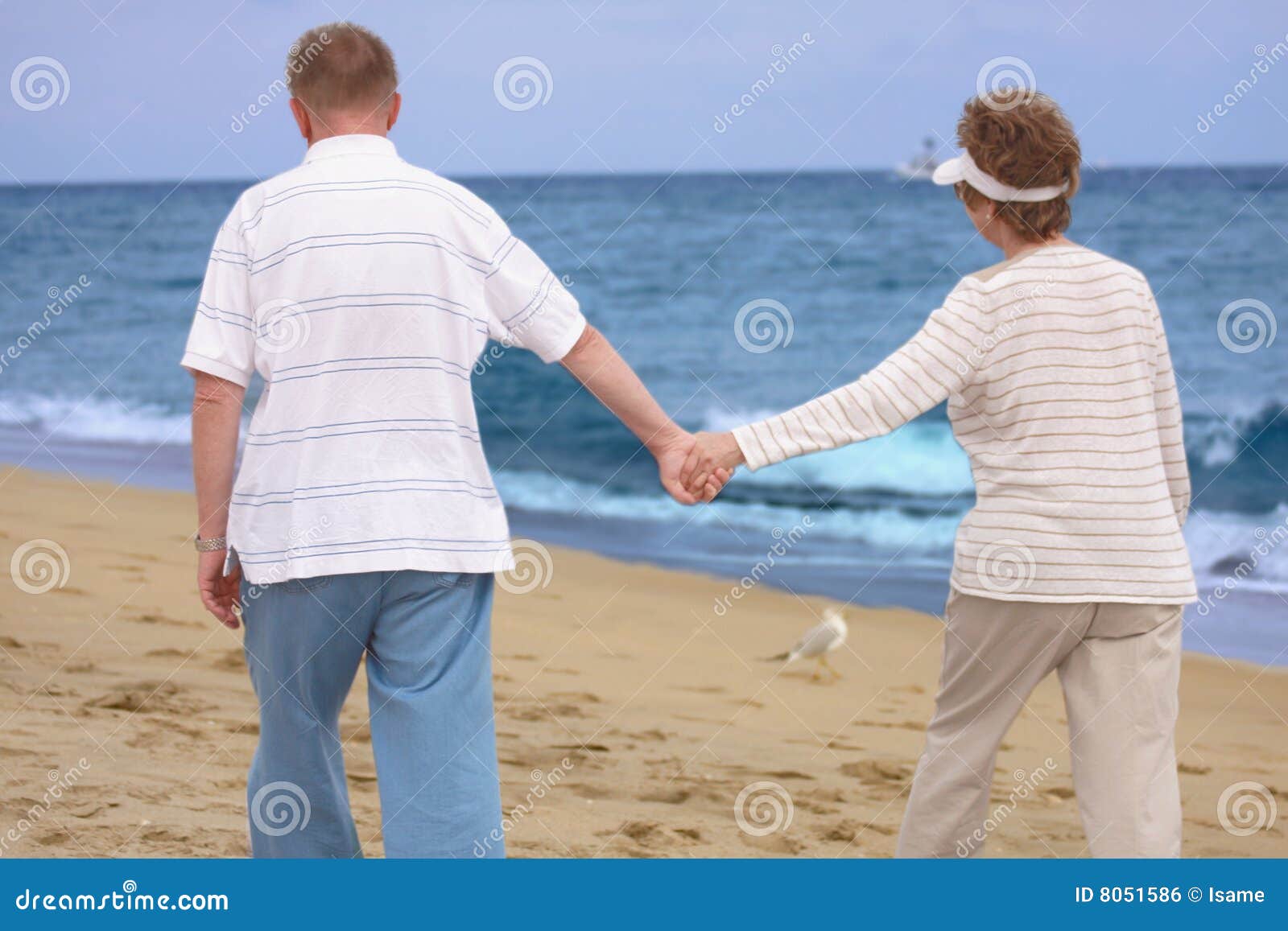 Happy Retired Couple Holding Hands Stock Photo - Image of holiday ...