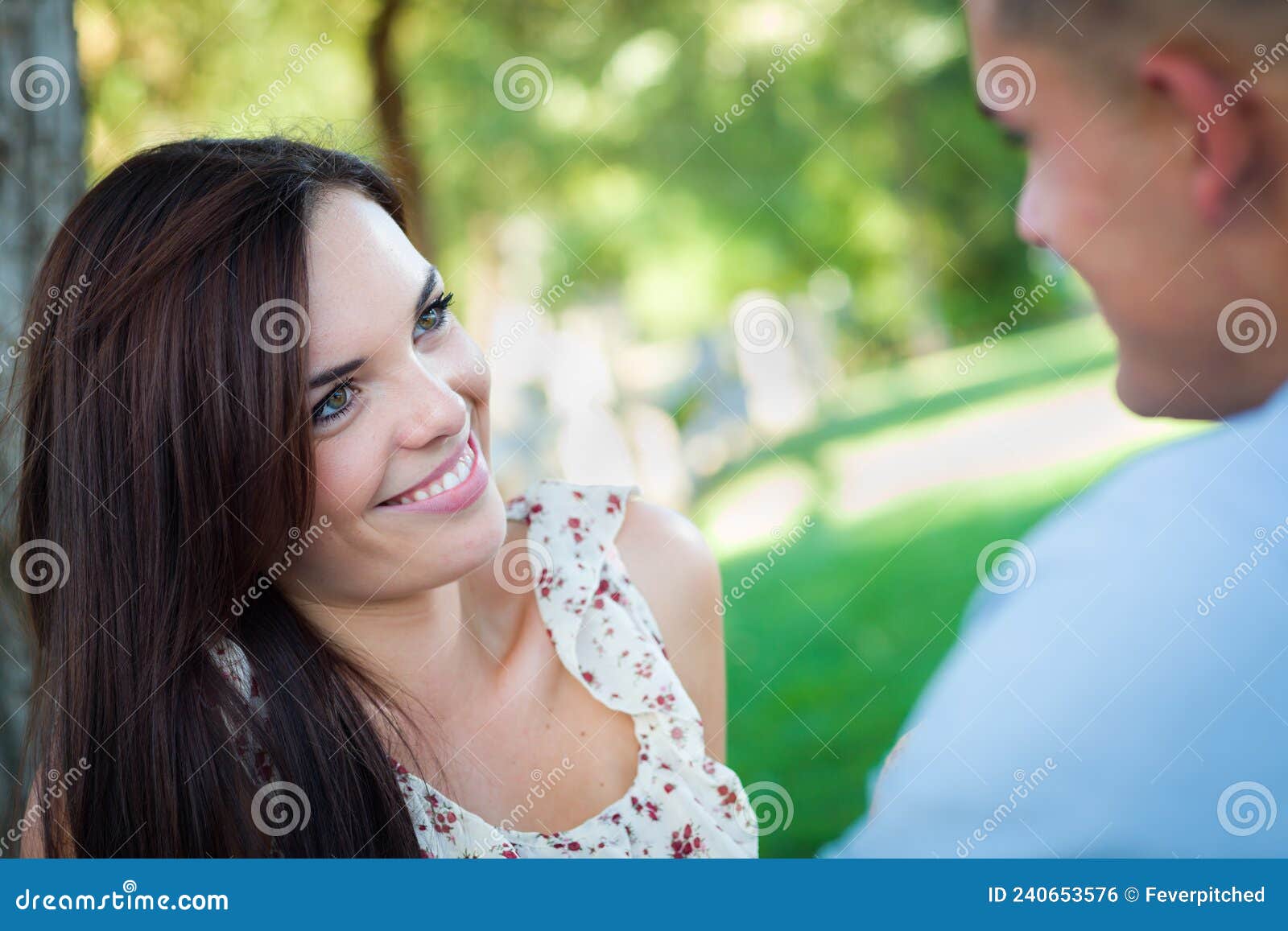 Happy Romantic Caucasian Couple Talking in the Park Stock Photo - Image ...
