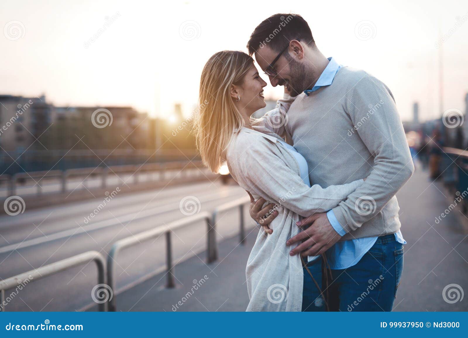 Happy Romantic Couple Hugging and Smiling Stock Photo - Image of ...