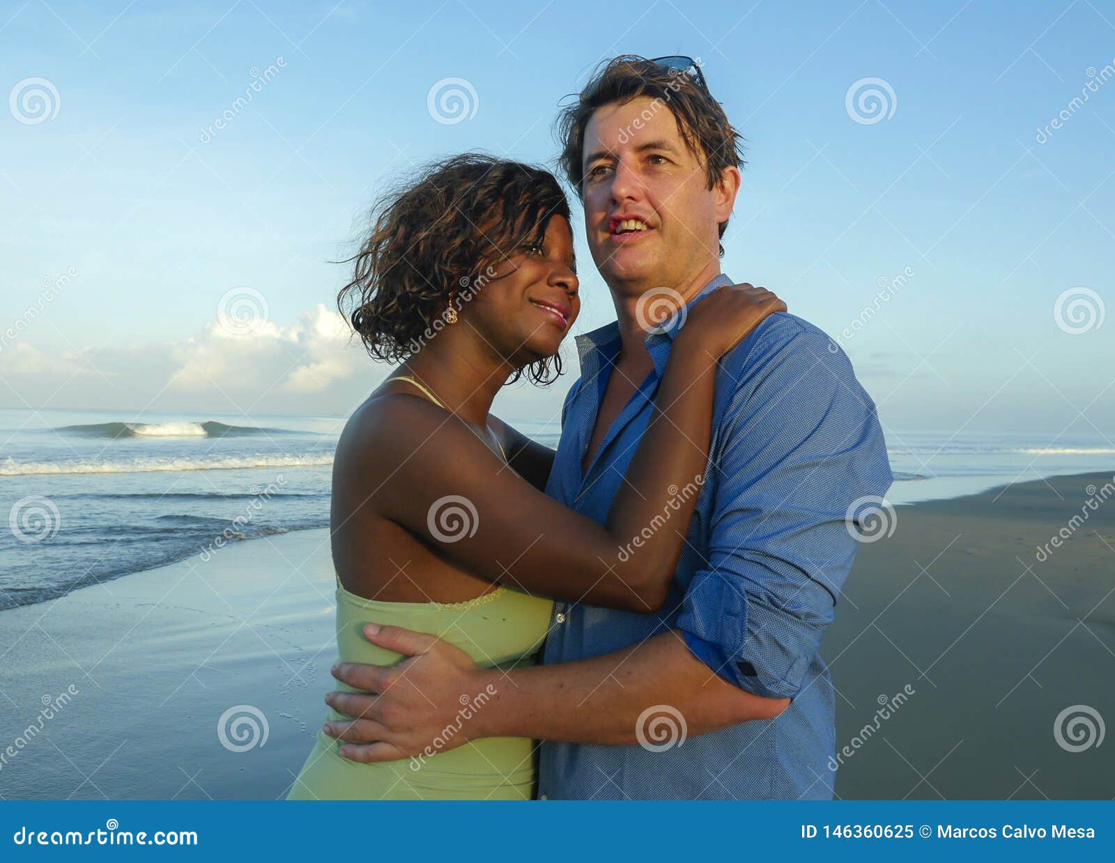 Happy And Romantic Mixed Race Couple With Attractive Black African