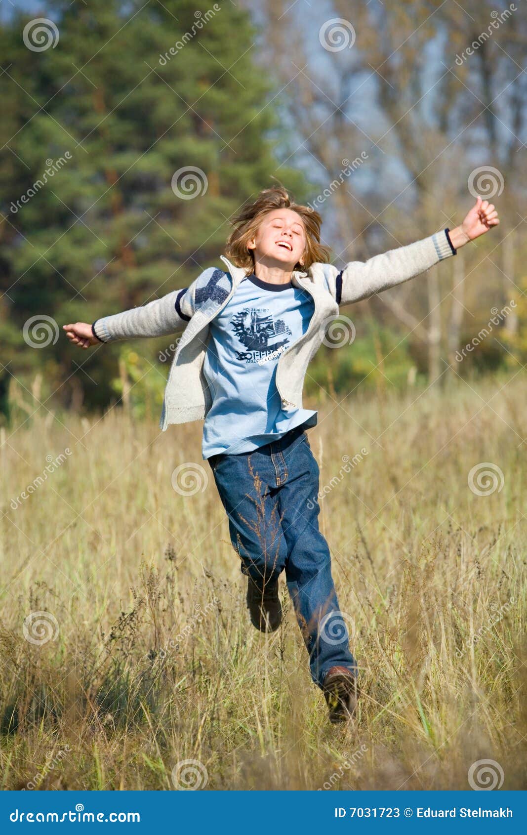 Happy running boy stock image. Image of playful, celebrate - 7031723