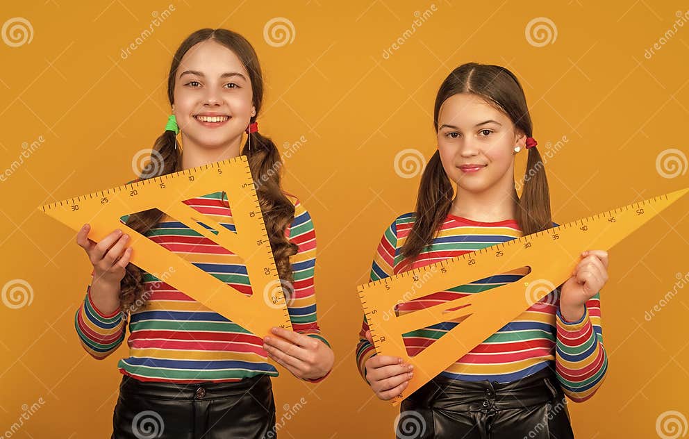 Happy School Children Hold Math Tool of Triangle Stock Photo - Image of ...