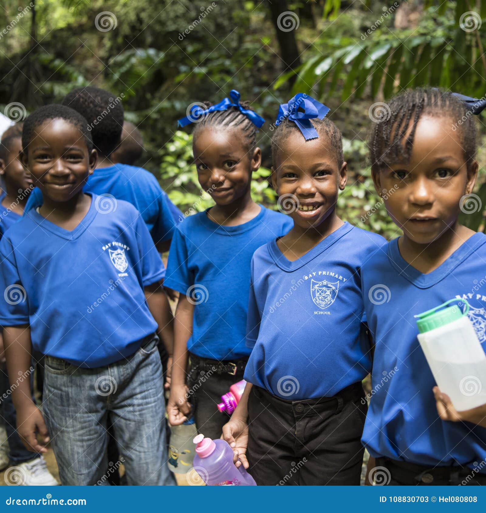 Education In Rainforest Of Barbados Happy School Girl Between Other Girls And Boys Editorial 1955