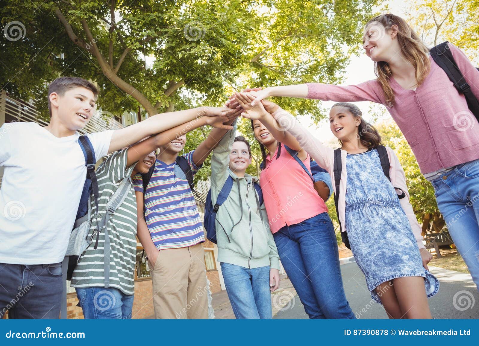 Happy School Kids Forming Hand Stack in Campus Stock Photo - Image of ...