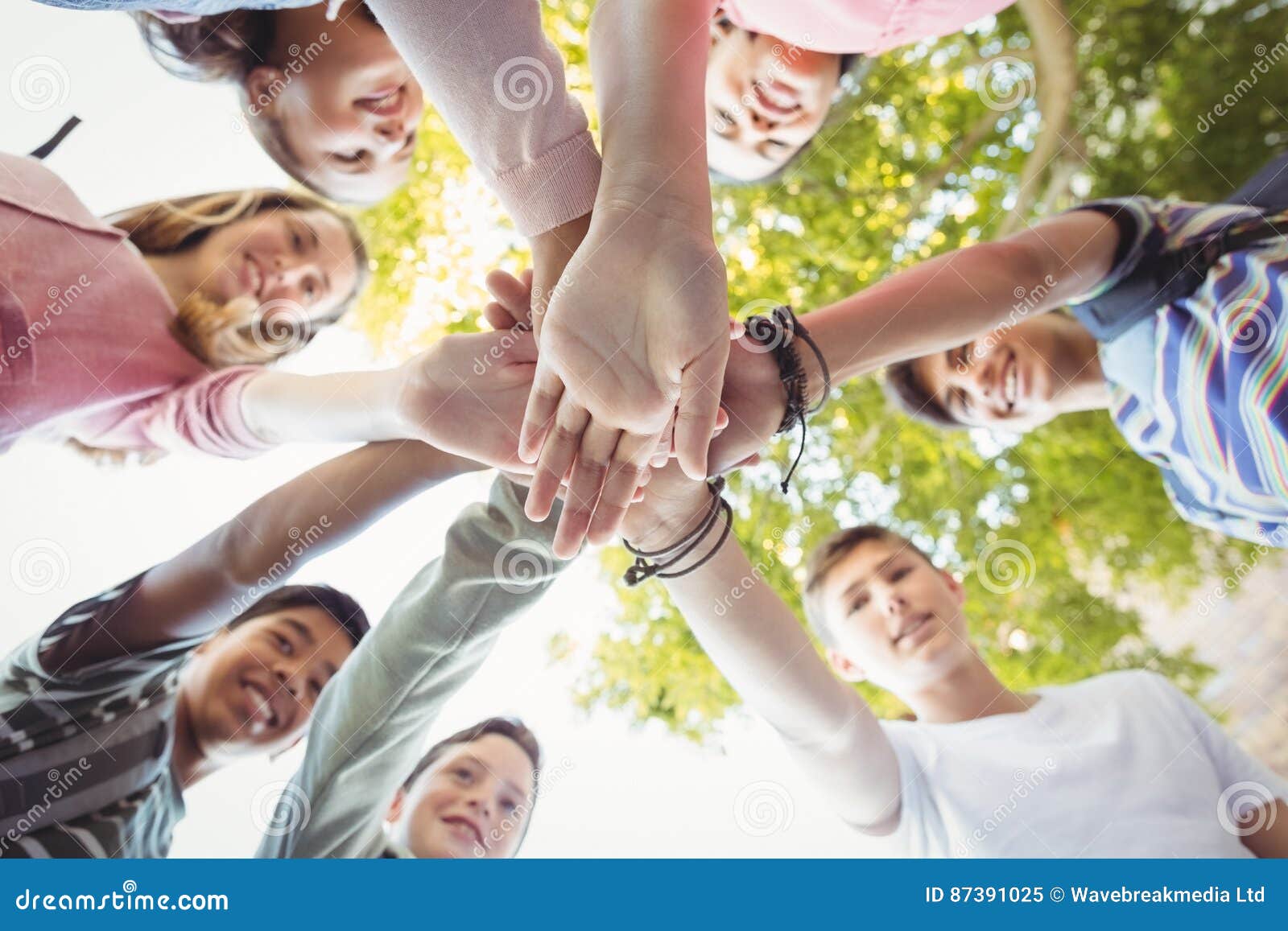 Happy School Kids Forming Hand Stack in Campus Stock Image - Image of ...