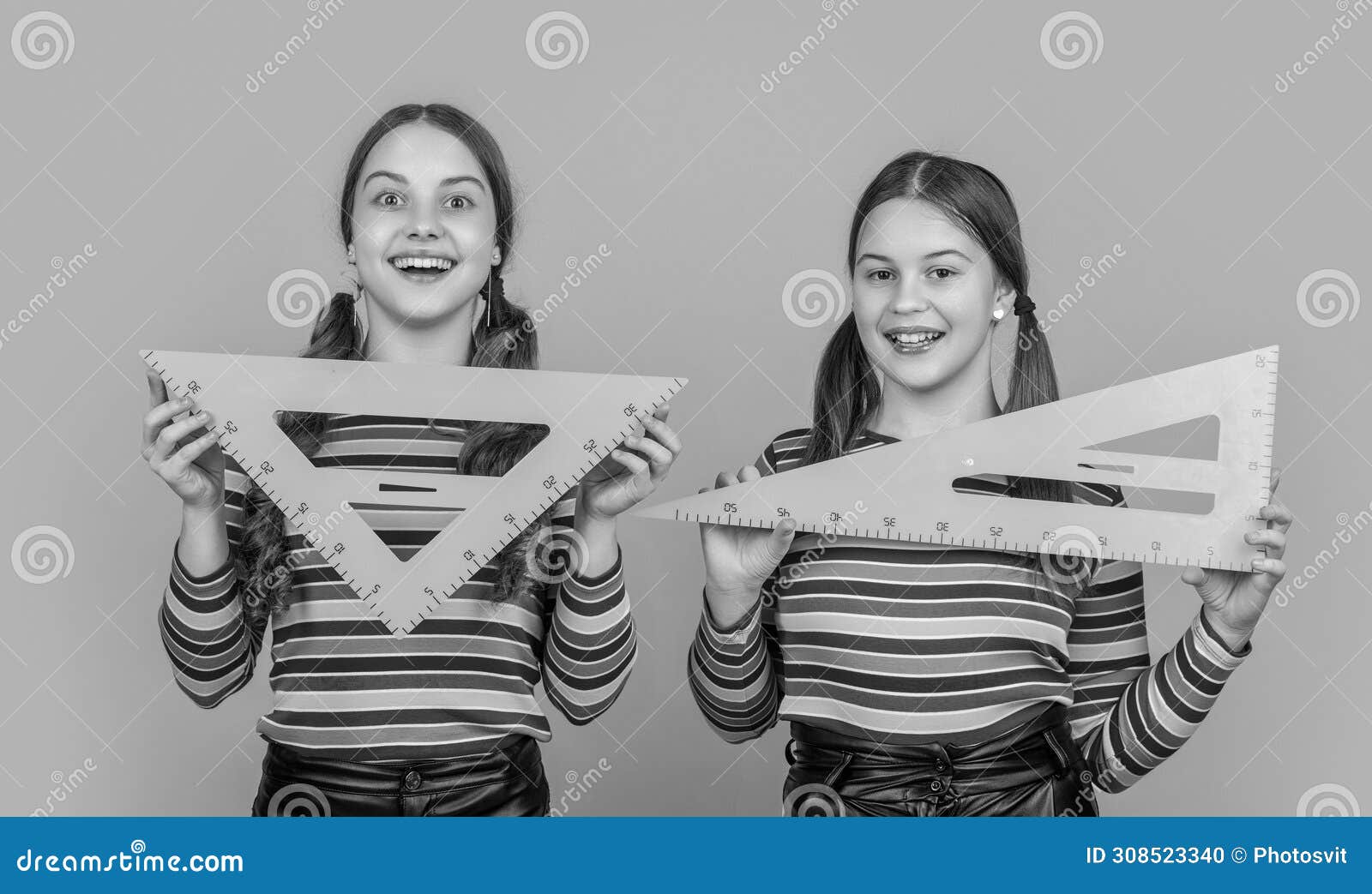 Happy School Kids Hold Math Tool of Triangle Stock Photo - Image of ...
