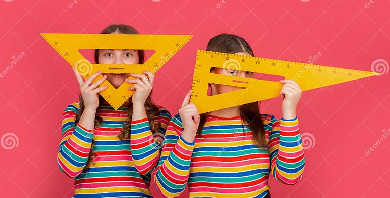 Happy School Students Hold Math Tool of Triangle Stock Photo - Image of ...