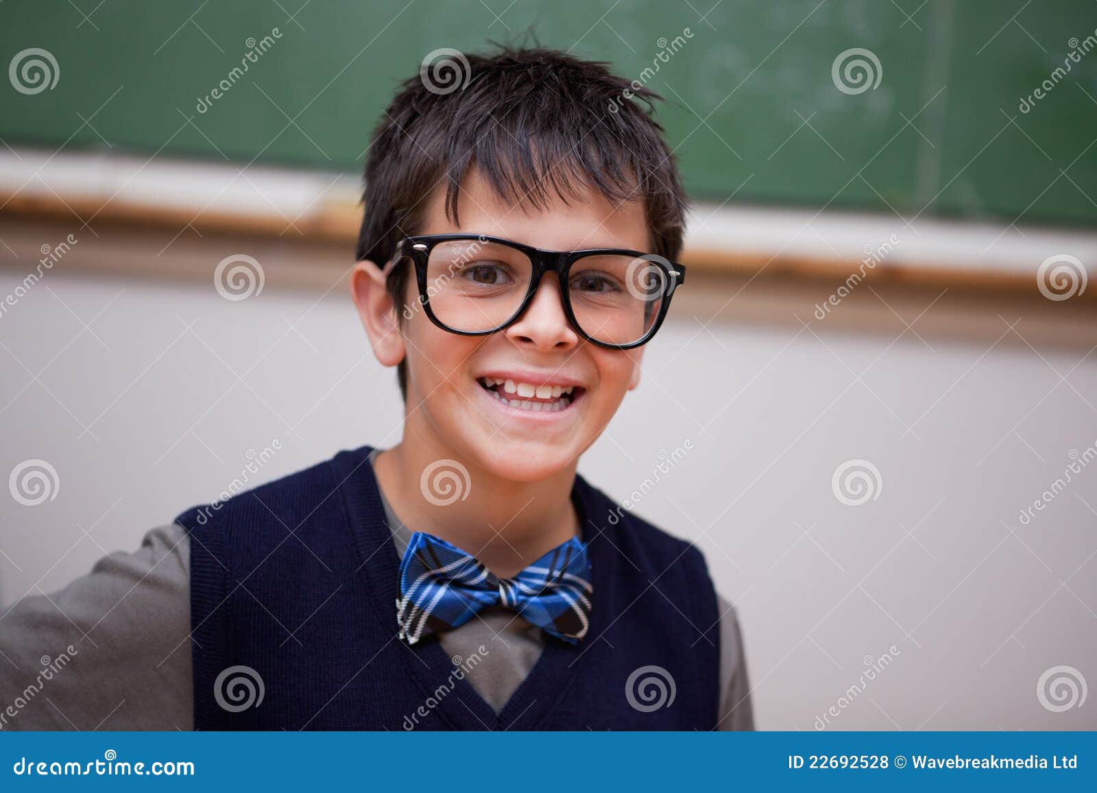 Happy schoolboy posing stock photo. Image of concentrated - 22692528