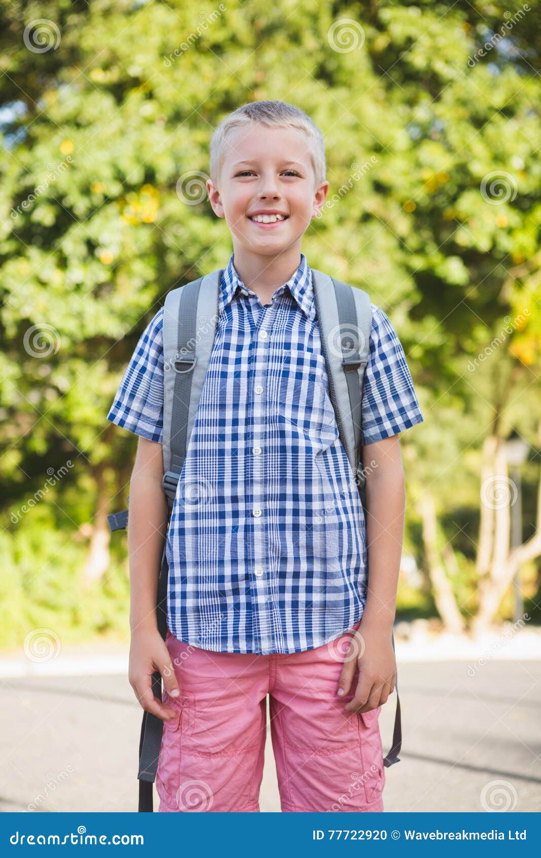 Happy Schoolboy Standing in Campus Stock Photo - Image of schoolchild ...