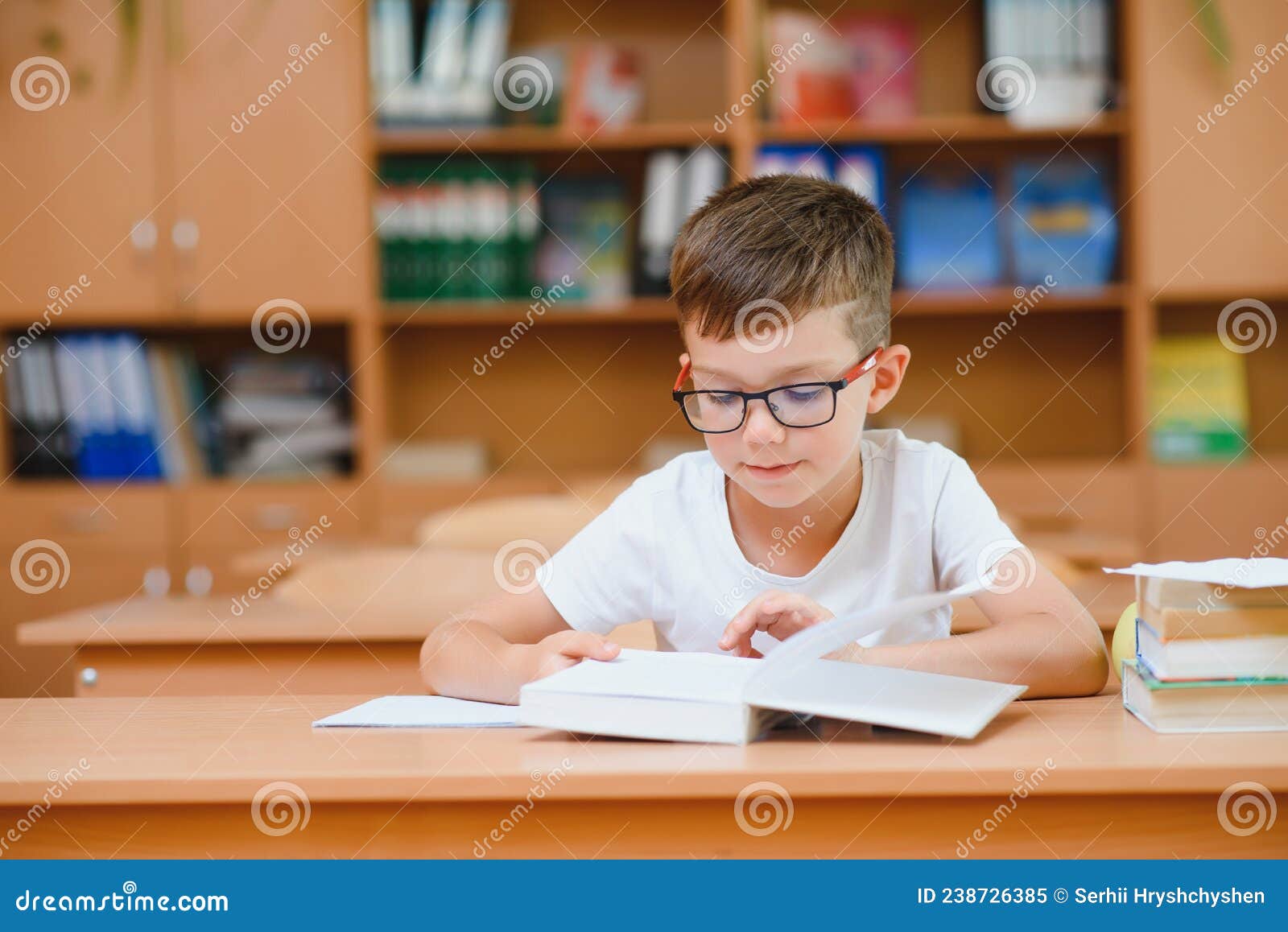 Happy Schoolboys Sitting at Desk, Classroom Stock Image - Image of ...