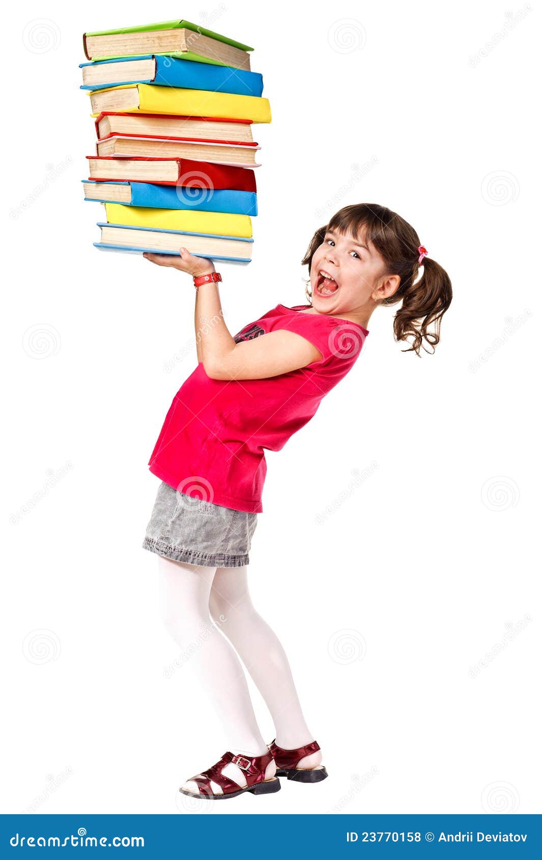 Happy Schoolgirl with a Stack of Heavy Books Stock Photo - Image of ...
