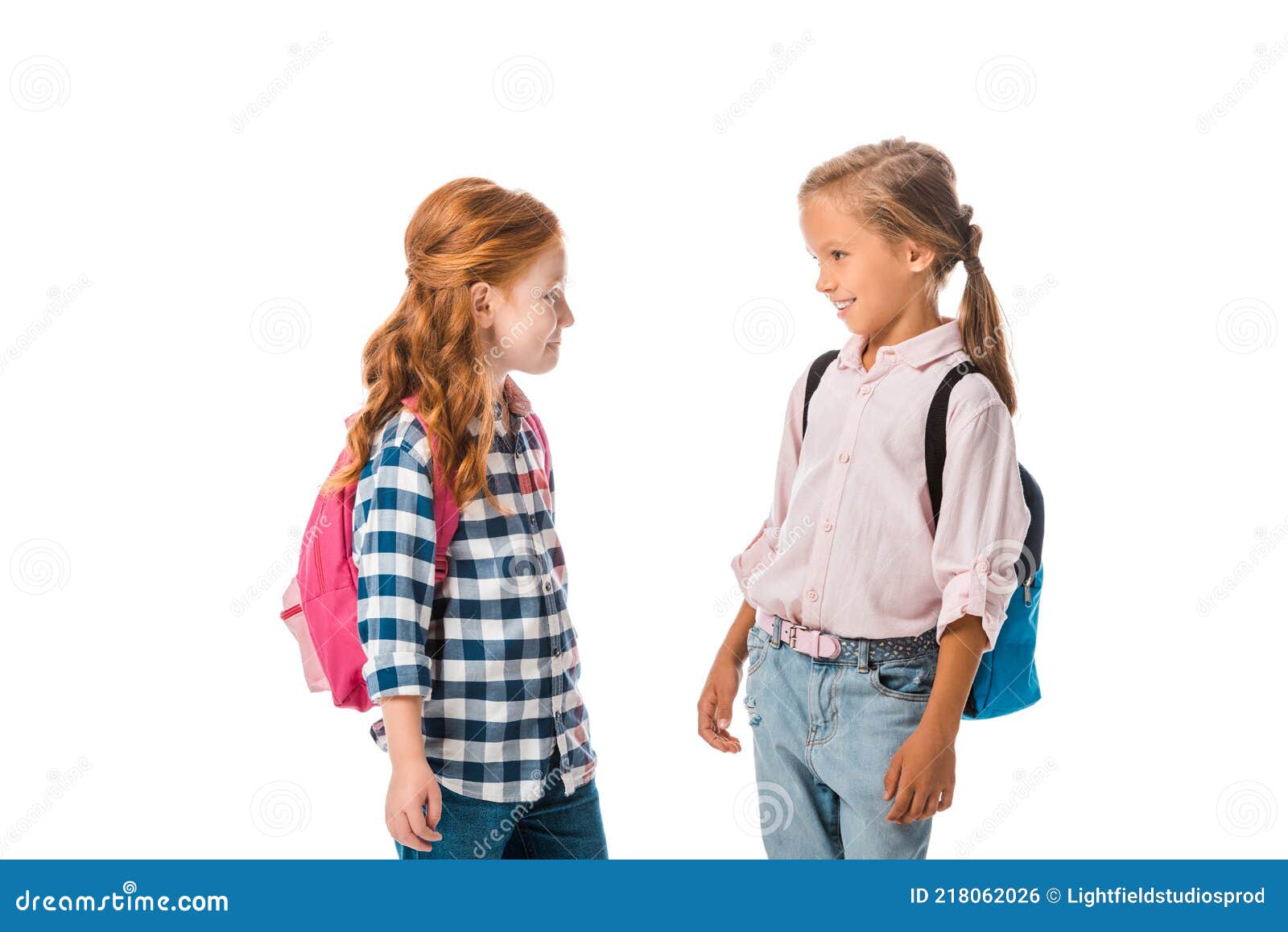 Happy Schoolkids with Backpacks Looking at Each Other Isolated on White ... Happy Schoolkids with Backpacks Looking at Each Other Isolated on White ...