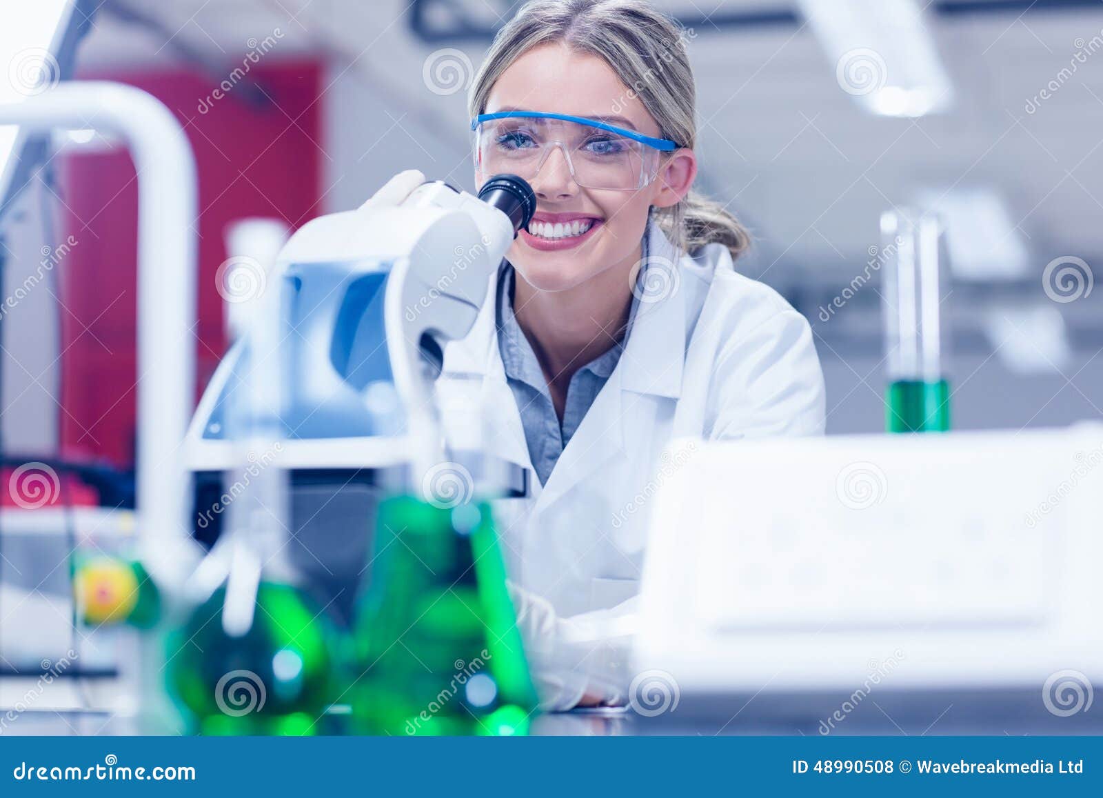 Happy Science Student Working with Microscope in the Lab Stock Photo ...