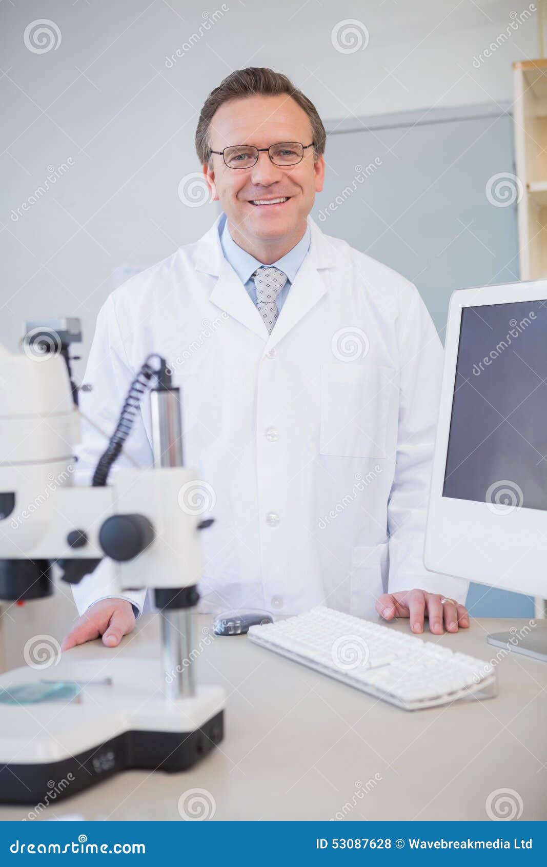 Happy Scientist Looking at Camera with Hands on Table Stock Photo ...