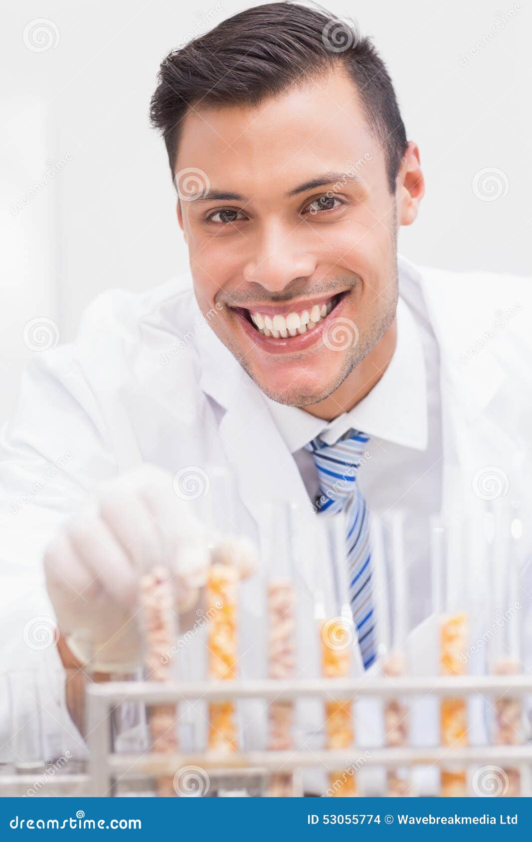 Happy Scientist Looking at Camera with Tubes of Corn and Kernel Stock ...
